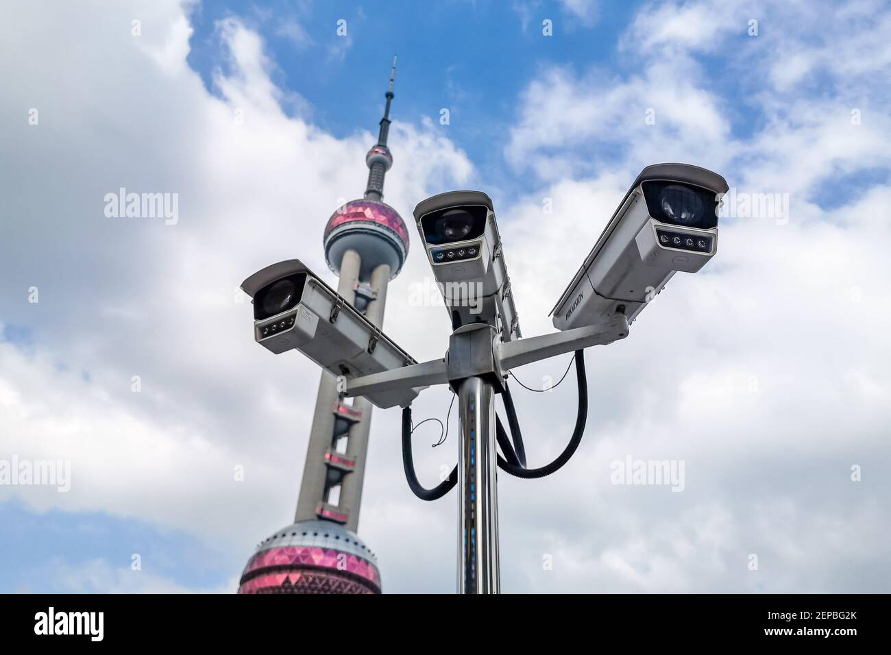 Hikvision surveillance cameras are seen on the ring overpass near the ...