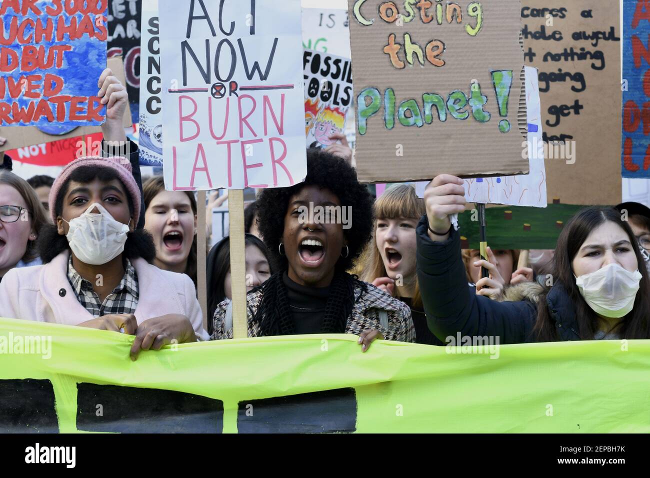 Environmental protesters holding placards while shouting slogans during ...