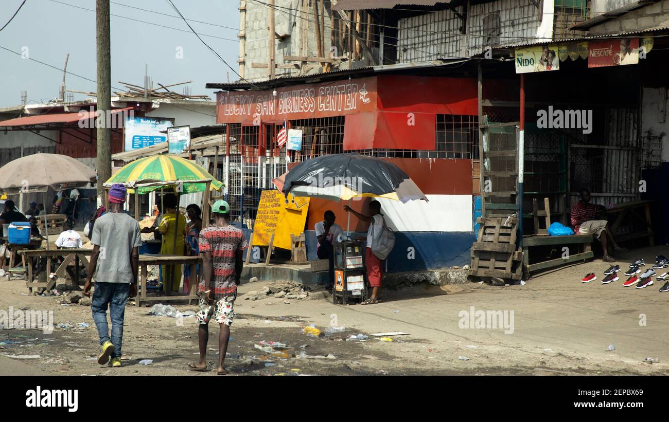 Driving busy market street Monrovia Liberia POV. Liberia in West Africa ...