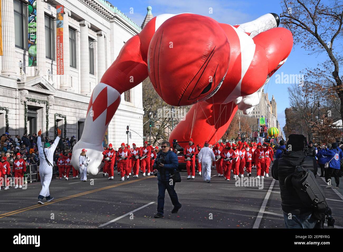 Handlers struggle to keep Power Rangers Mighty Morphin Red Ranger giant ...
