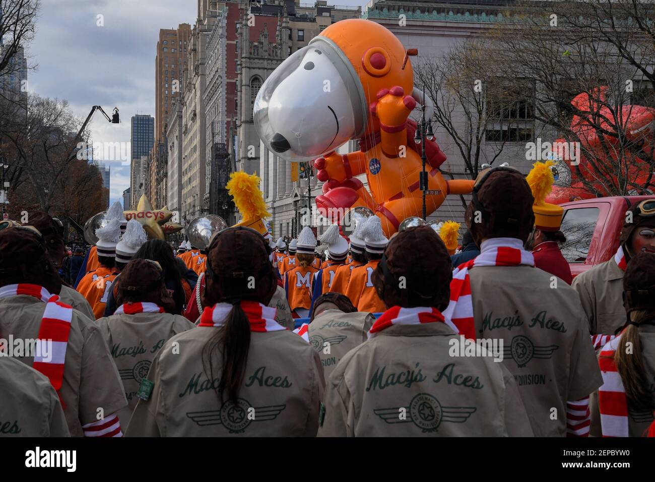 Participants watch Astronaut Snoopy balloon during the 93rd Annual Macy ...