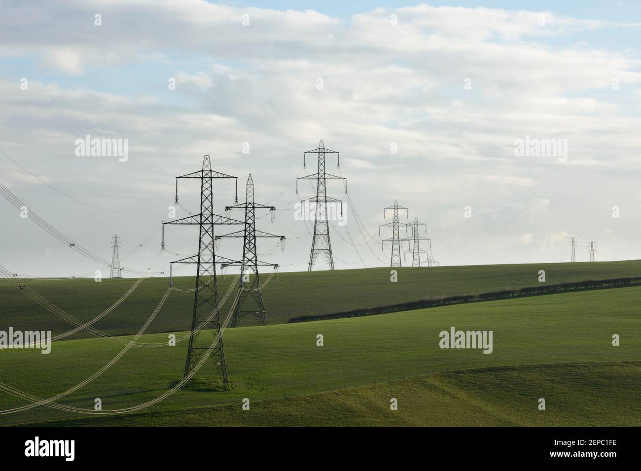 Pylons in fields hi-res stock photography and images - Alamy