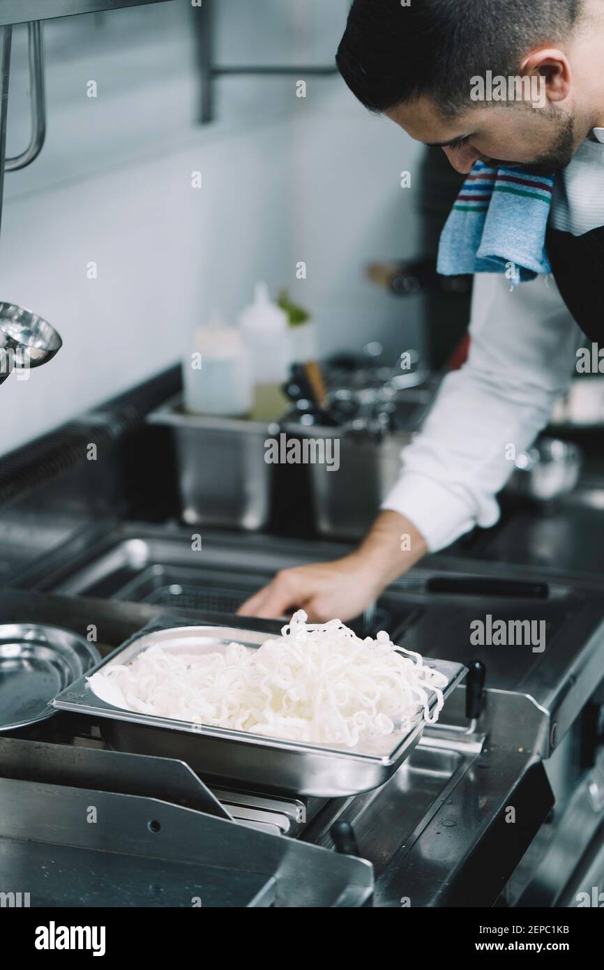 Chef frying rice hi-res stock photography and images - Alamy