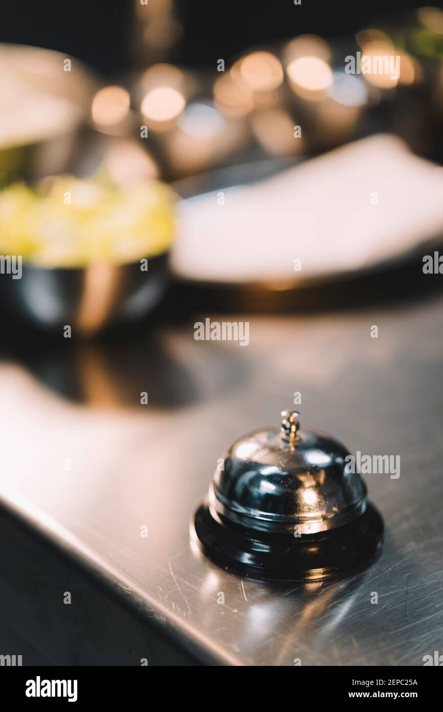 order bell over stainless steel bench in a professional kitchen Stock ...