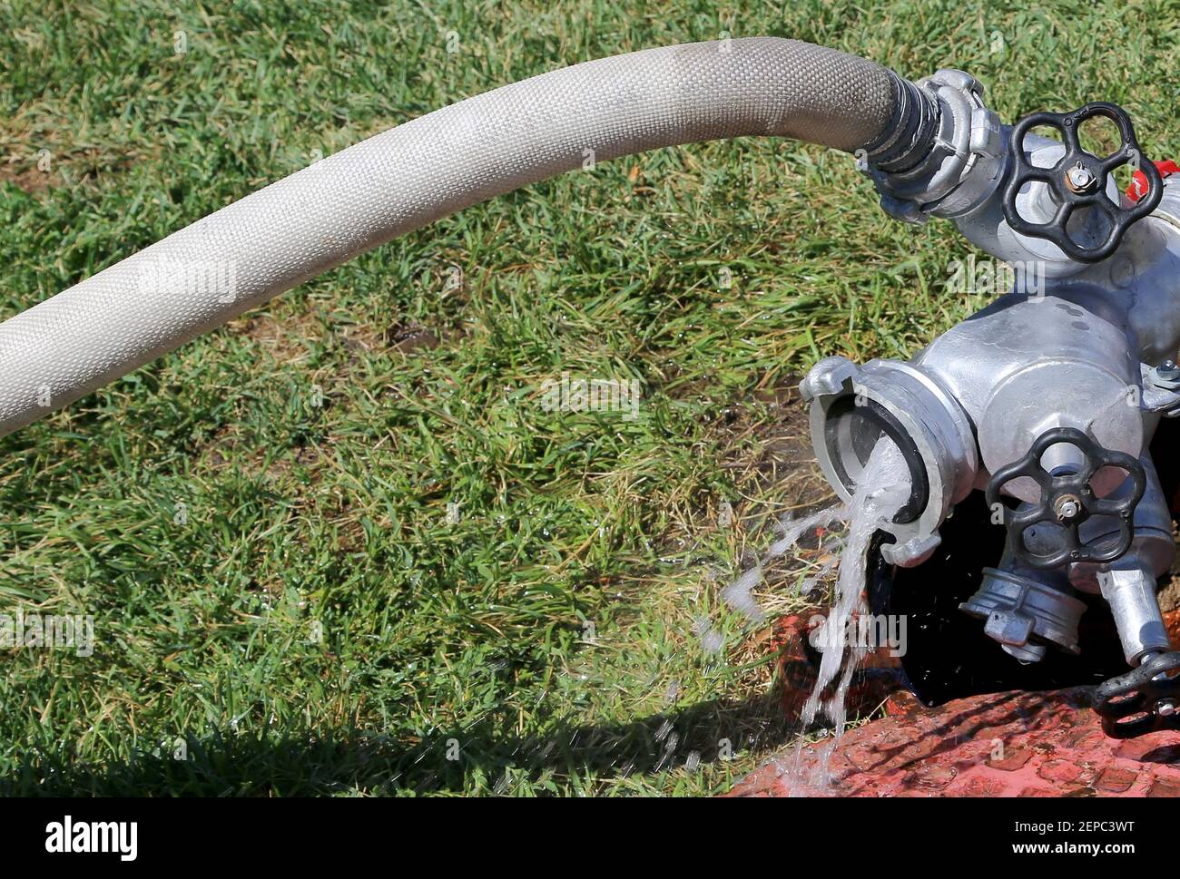 water flow coming out from a fire hydrant Stock Photo - Alamy