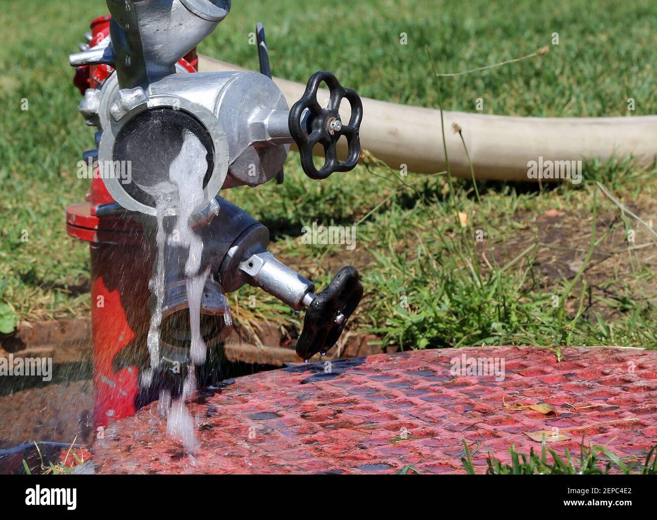 water flow coming out from a fire hydrant Stock Photo - Alamy