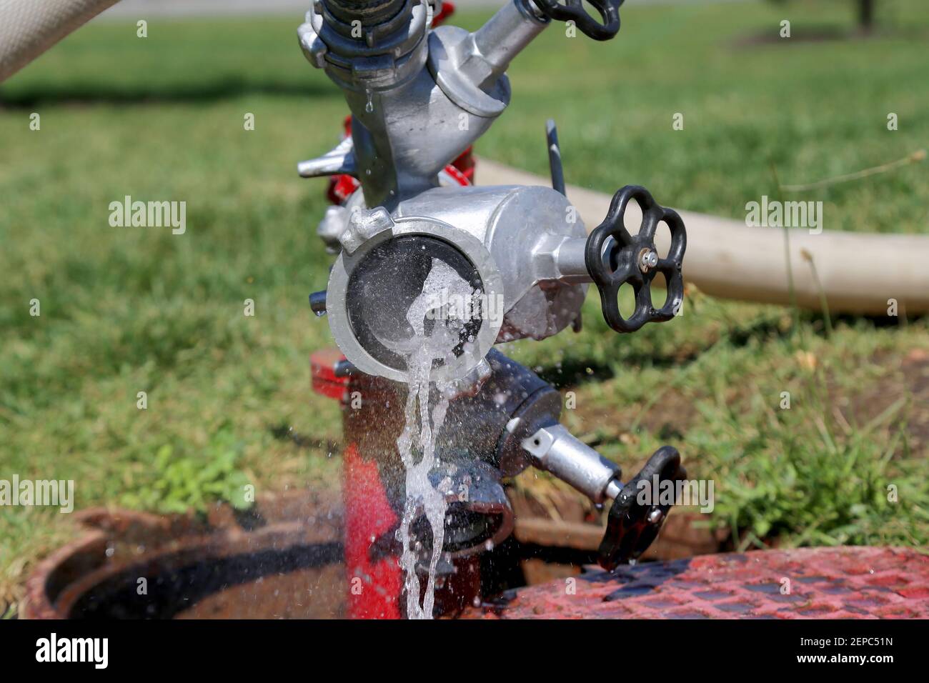 water flow coming out from a fire hydrant Stock Photo - Alamy
