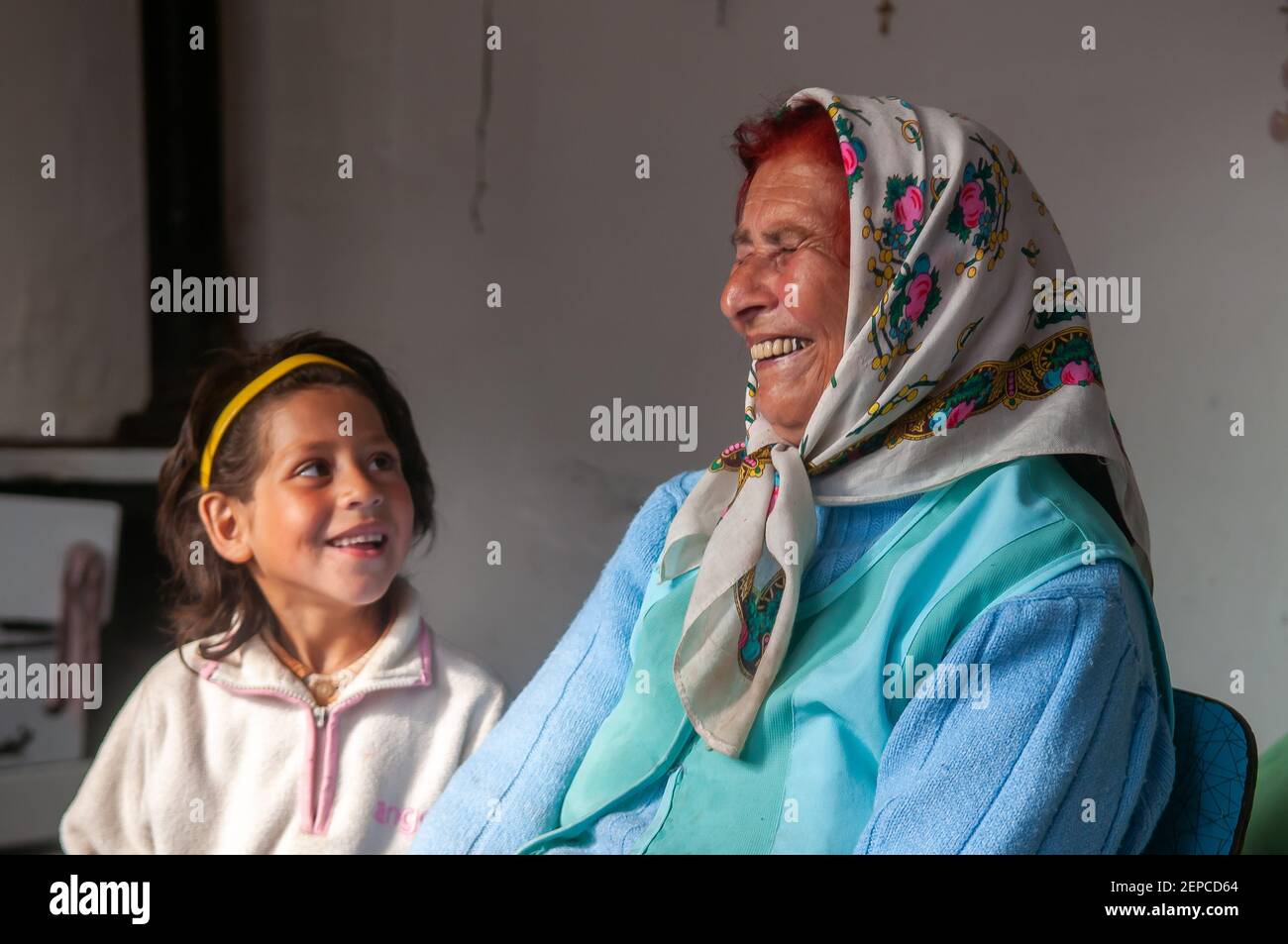 Lomnicka, Slovakia. 05-16-2018. Smiling Grandmother and Gypsy grand ...