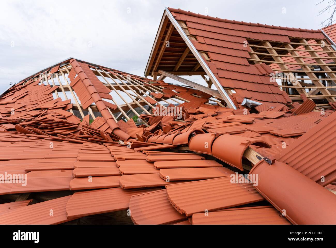 Broken roof after a storm Stock Photo - Alamy