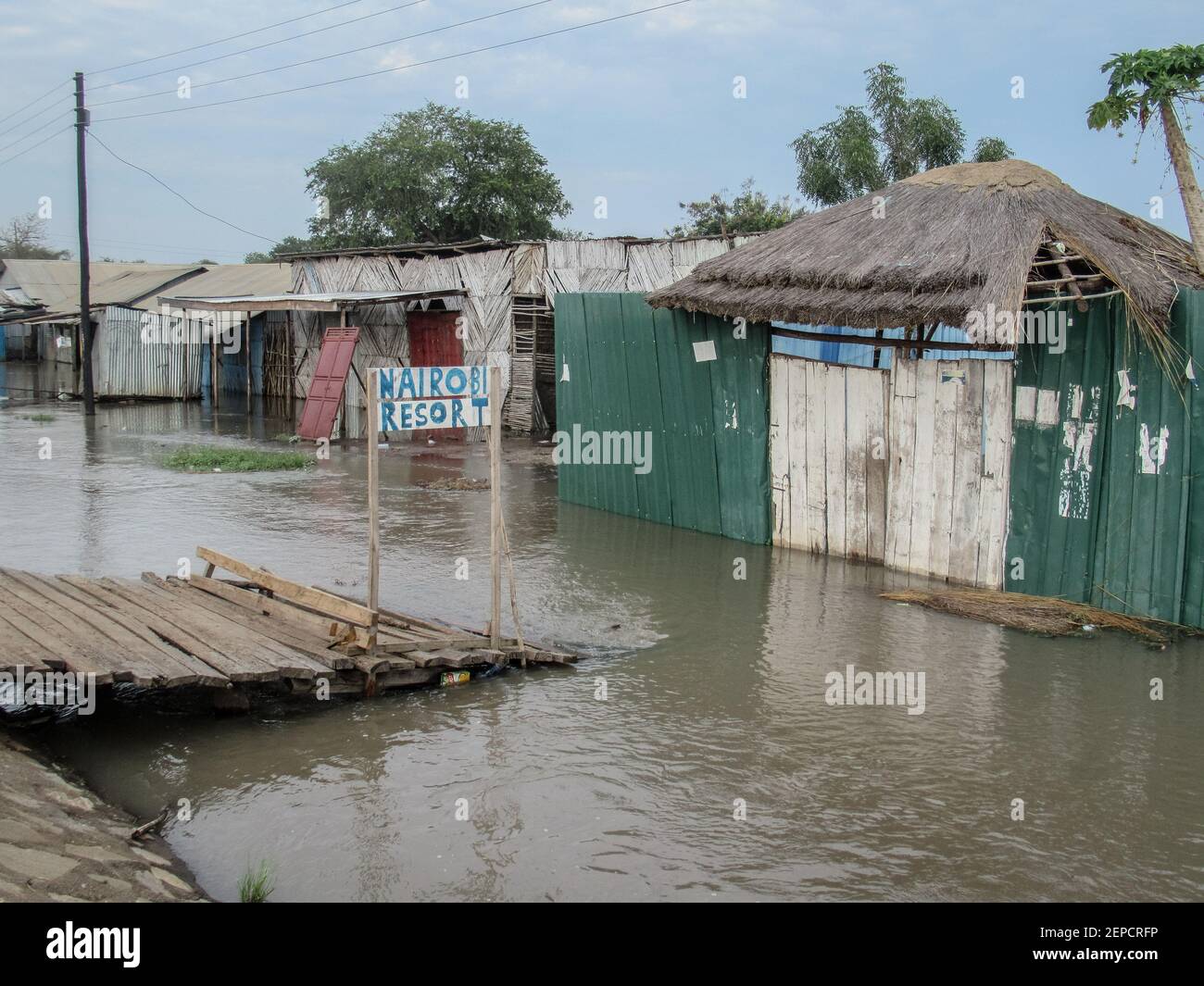 flooded structures. Businesses and homes damaged by flooding in Elegu ...