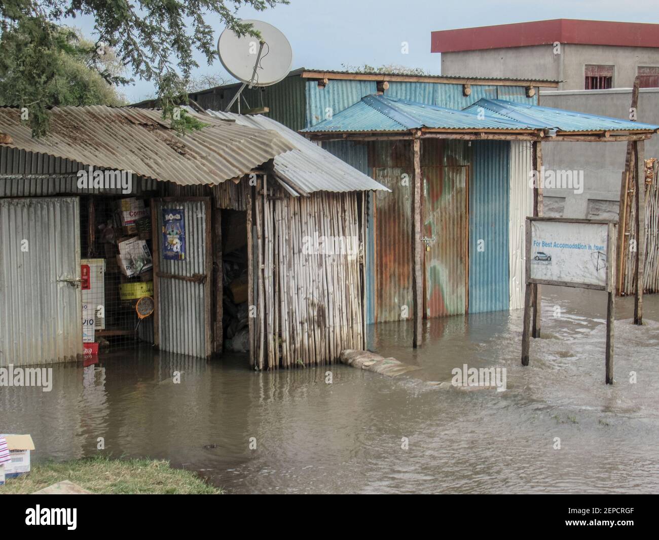 flooded structures. Businesses and homes damaged by flooding in Elegu ...