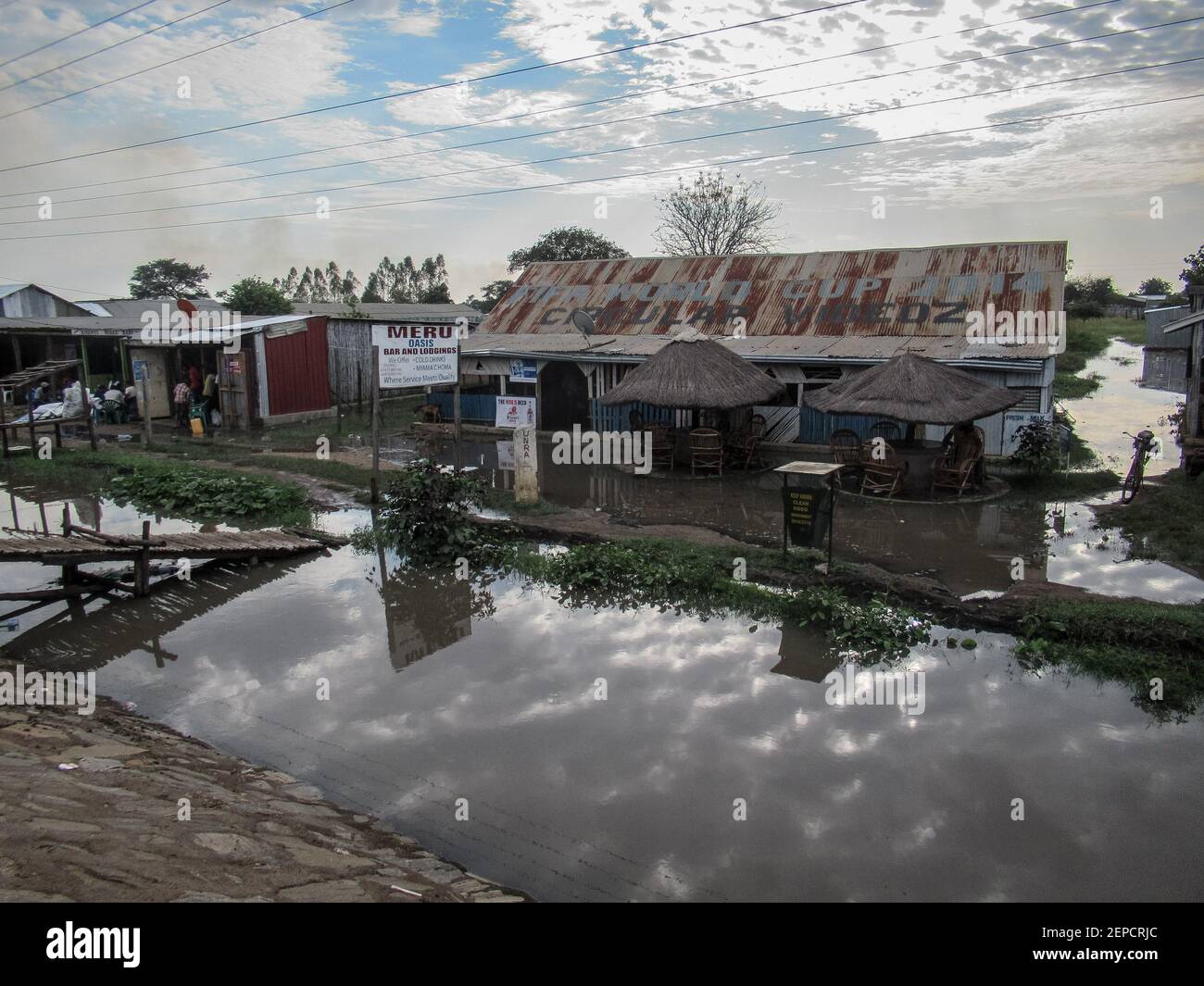 Buildings flooded. Businesses and homes damaged by flooding in Elegu ...