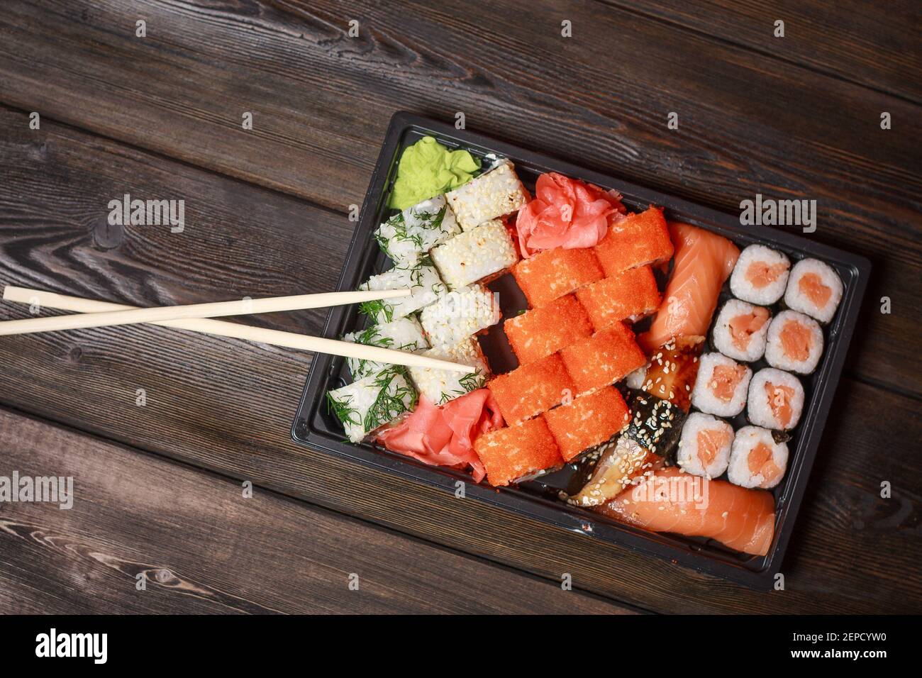 asian food sushi and roll set wooden sticks seafood Stock Photo - Alamy
