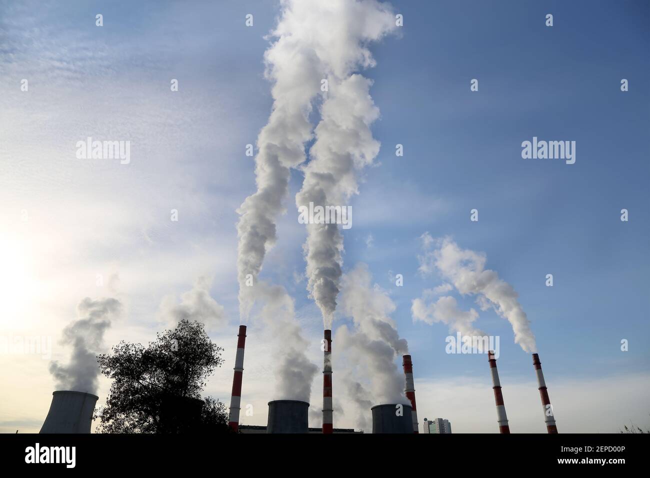 Smoke stacks at coal burning power plant Stock Photo - Alamy