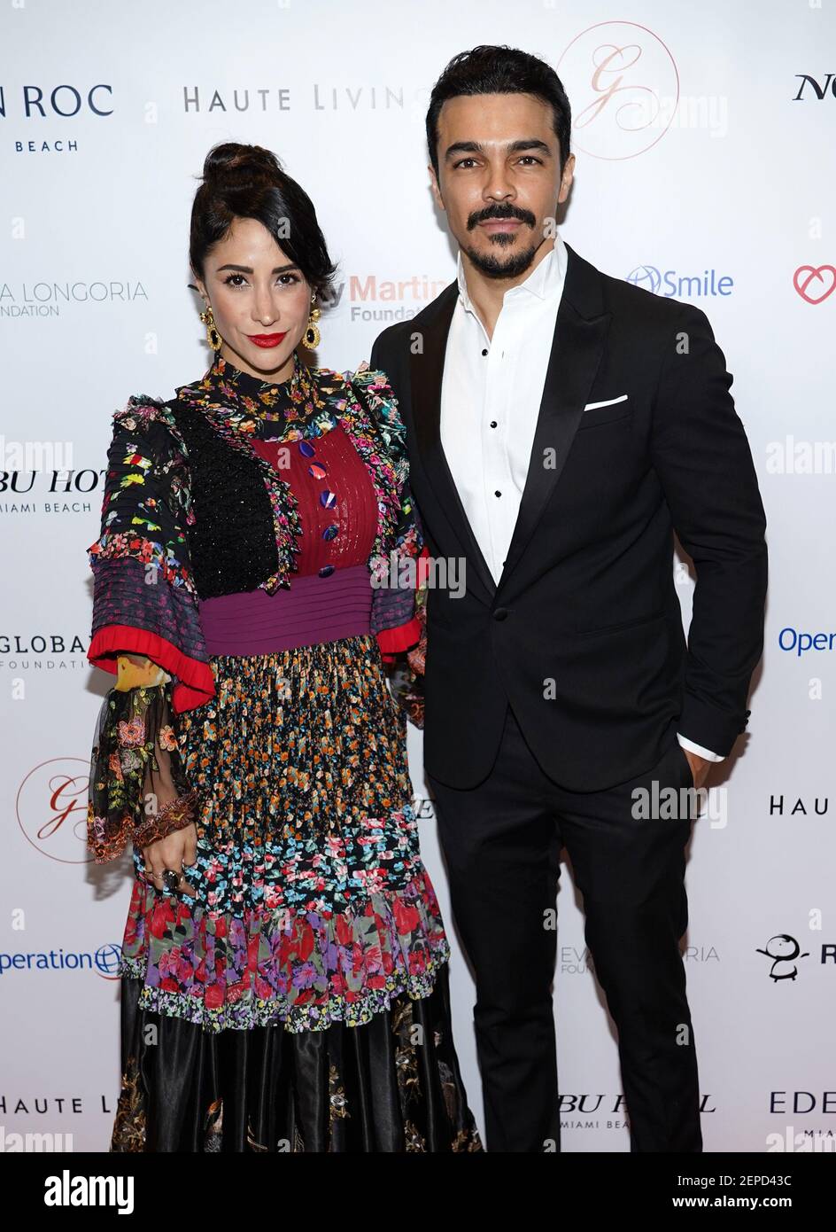 MIAMI BEACH, FL - DECEMBER 5: Lesley Ann Machado and Shalim Ortiz are ...