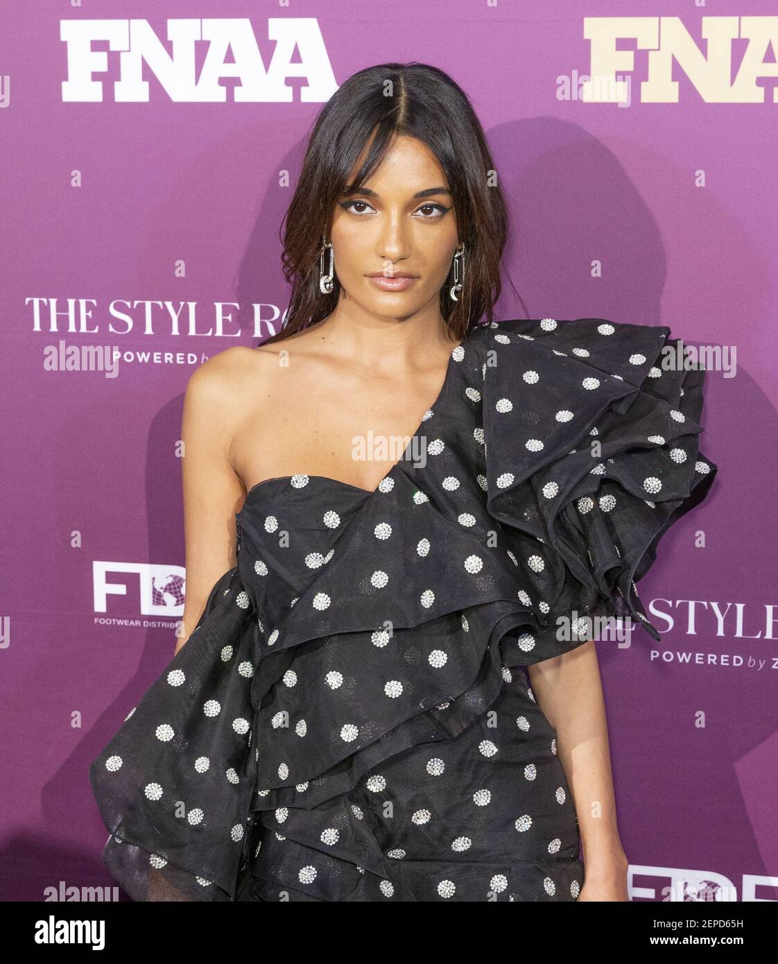 Amina Muaddi attends 33rd Annual Footwear News Achievement Awards at ...