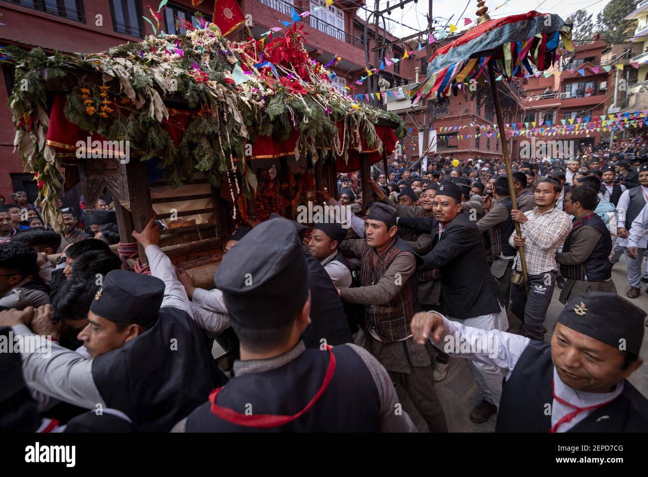 Nepalese devotees carry the chariot of Indrayani Goddess during the ...