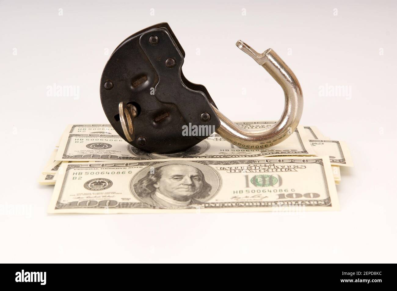 Hundred dollar bills money and a big old castle Stock Photo - Alamy