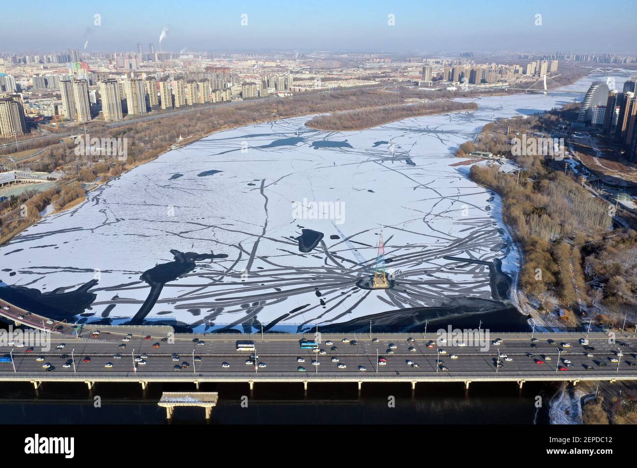 An aerial view of much of Hun River turning to be frozen on the day of ...