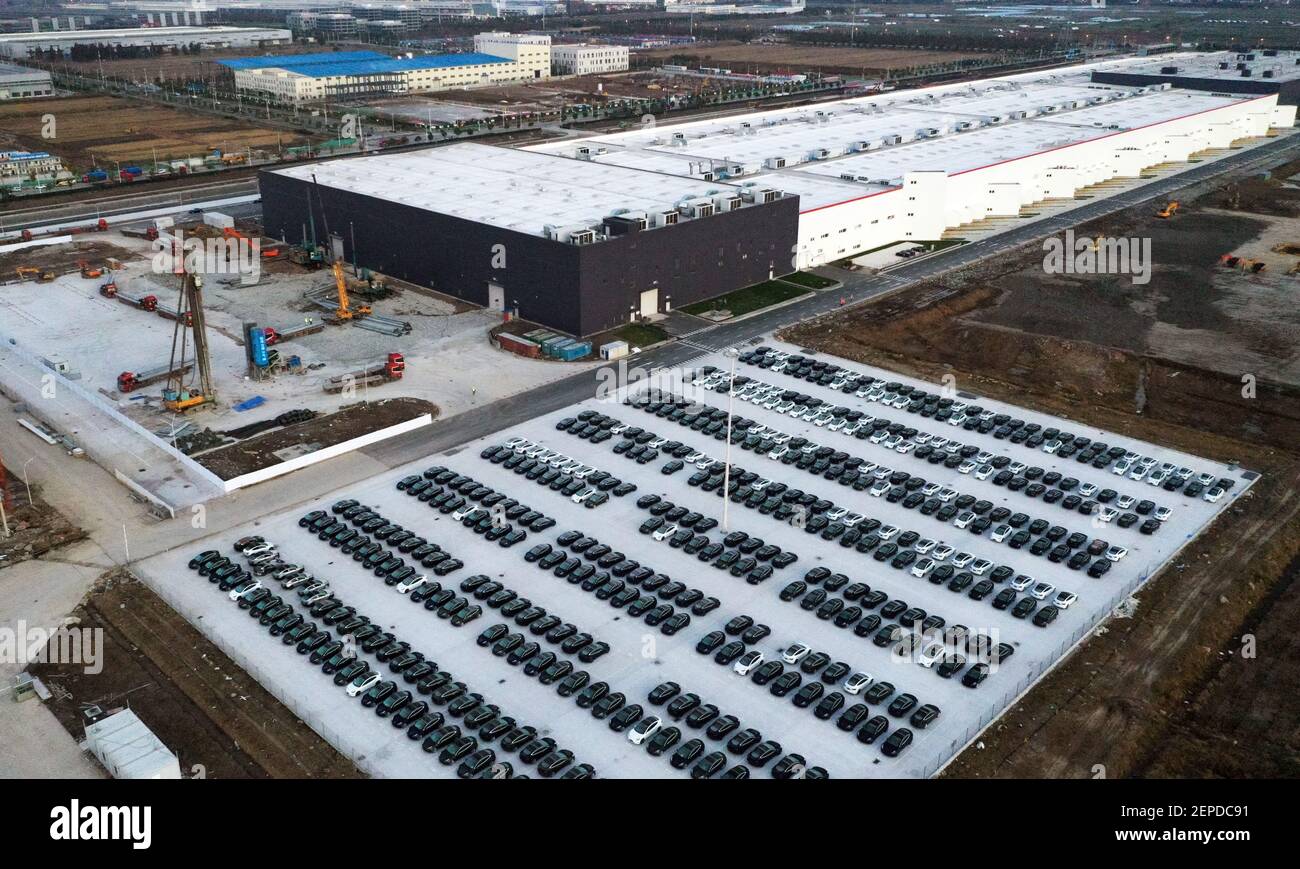 Aerial view of newly-manufactured Tesla Model 3 electric cars on the ...