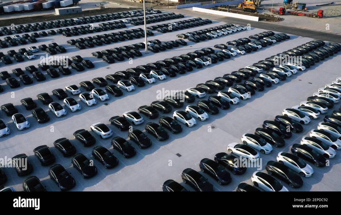 Aerial view of newly-manufactured Tesla Model 3 electric cars on the ...