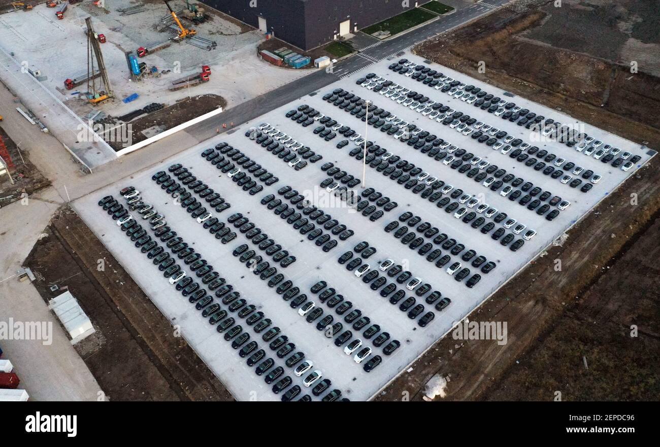 Aerial view of newly-manufactured Tesla Model 3 electric cars on the ...
