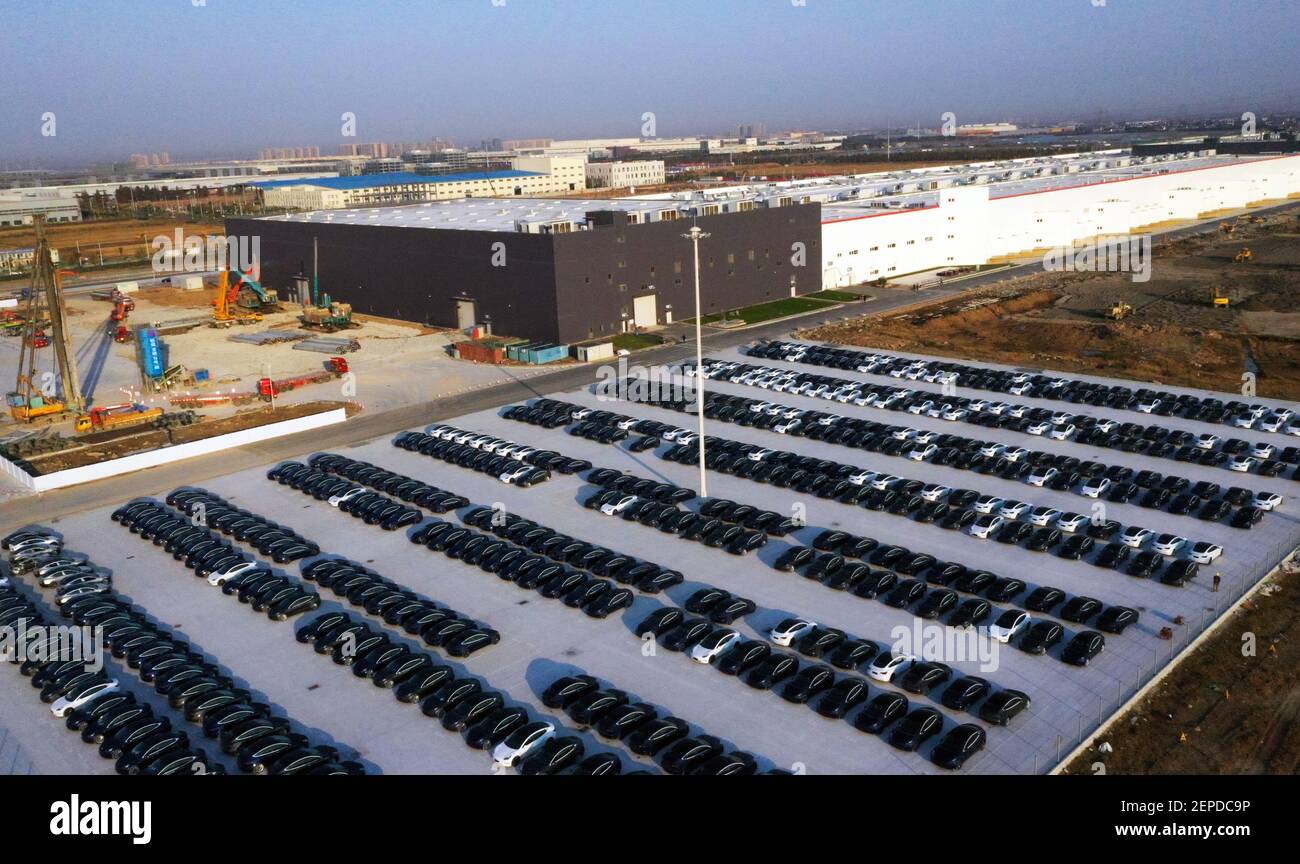 Aerial view of newly-manufactured Tesla Model 3 electric cars on the ...