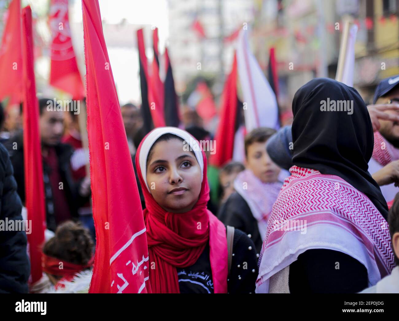 Palestinian girls with a flag during the rally. The Popular Front for ...