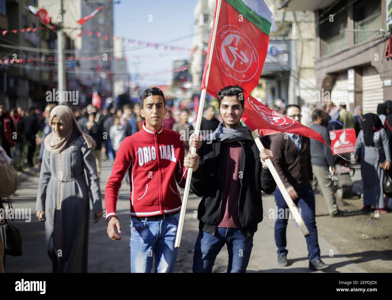 Palestinian supporters with flags during the rally. The Popular Front ...