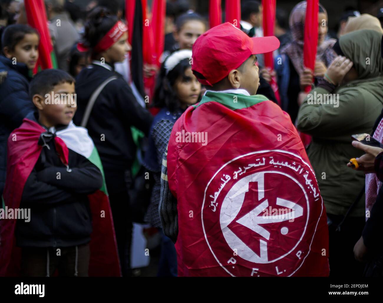 Palestinian kids wearing flags during the rally. The Popular Front for ...
