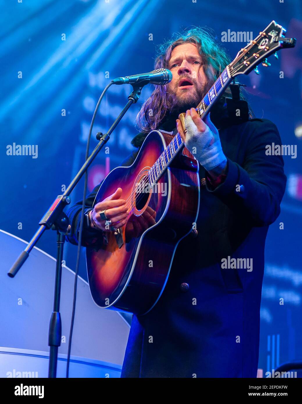 Jay Buchanan of "Rival Sons" sings at the World's Big Sleep Out in ...