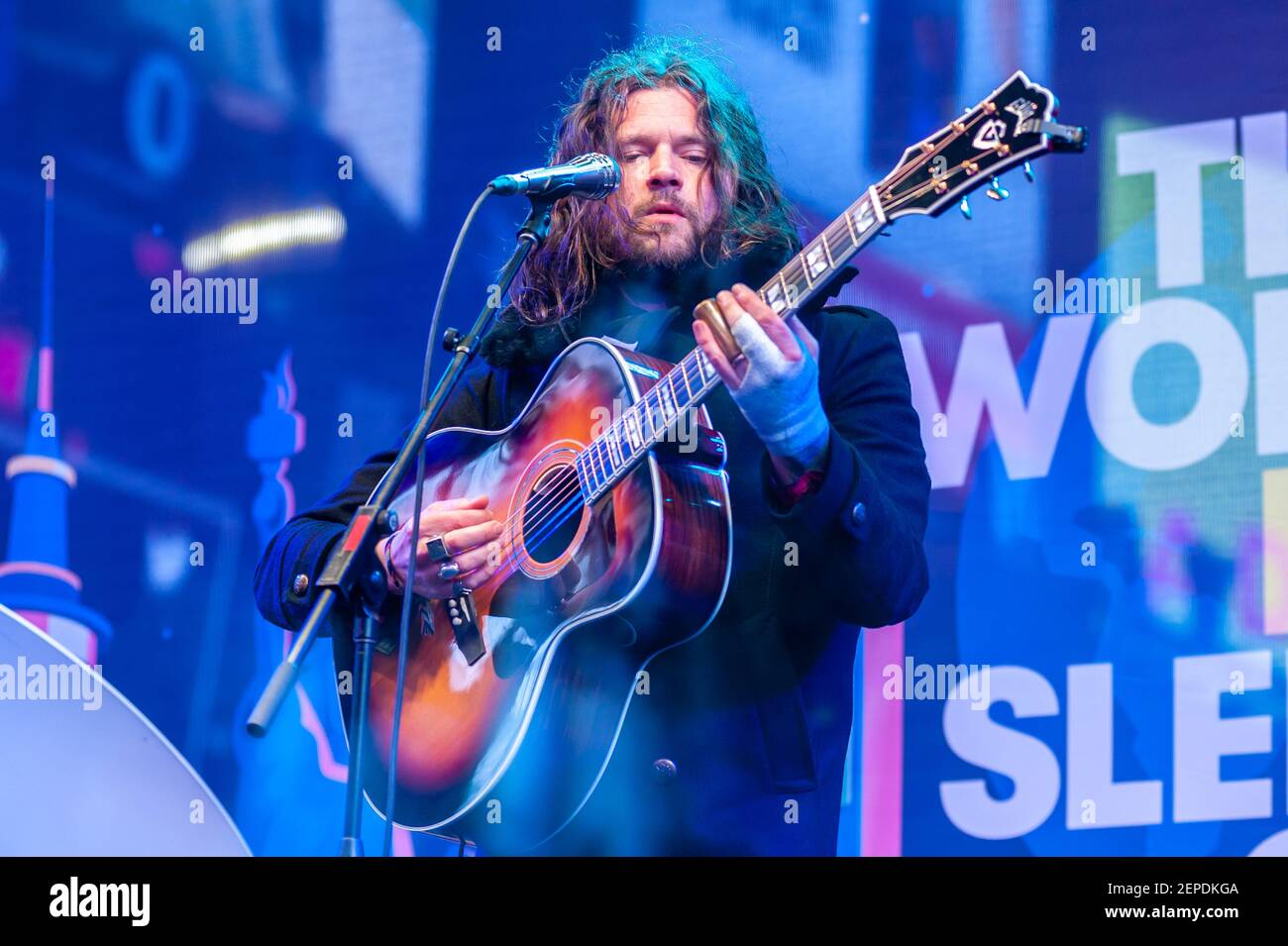 Jay Buchanan of "Rival Sons" sings at the World's Big Sleep Out in ...