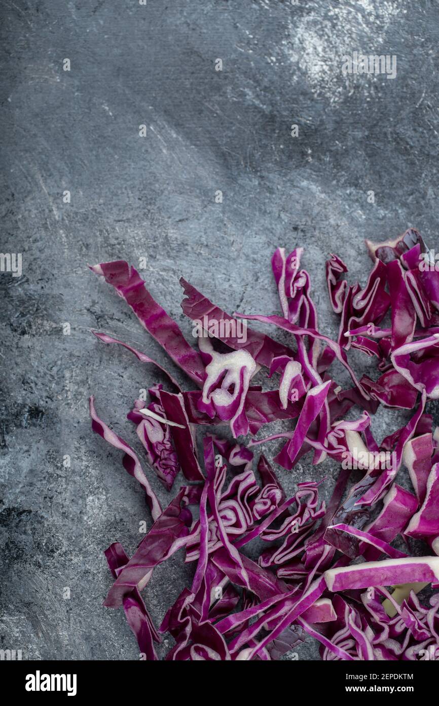 Vertical photo of chopped purple cabbage on grey background Stock Photo ...
