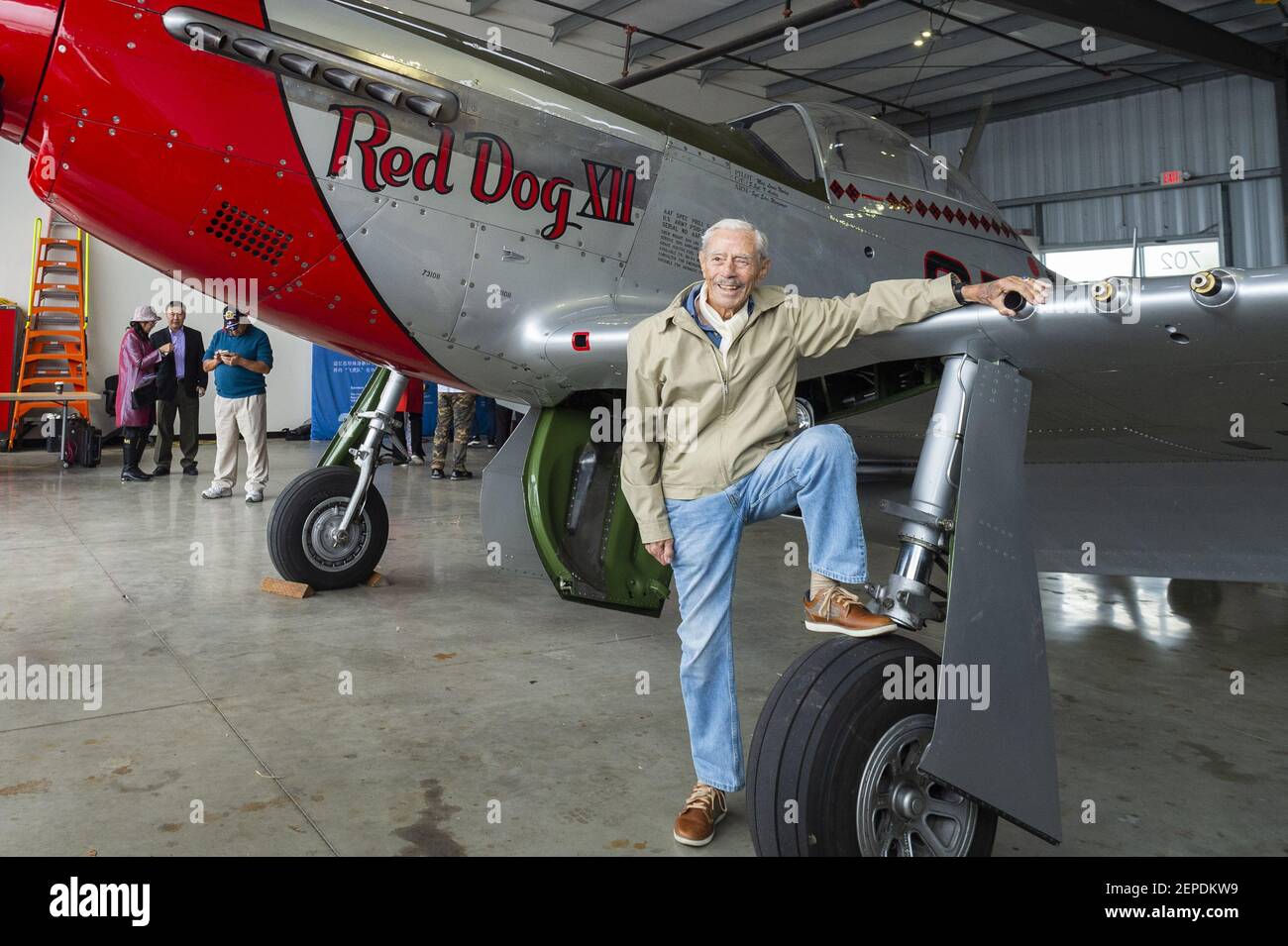 99 years old World War II veteran Harry Moyer poses in front of a P-51 ...