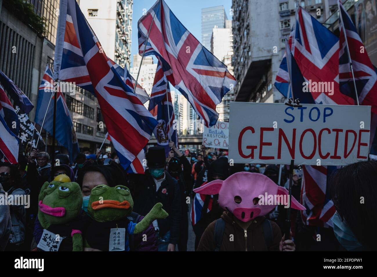 Protesters wave British flags while calling for international support ...