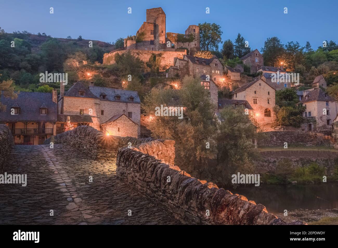 Along the old stone bridge in the quaint and charming medieval French ...