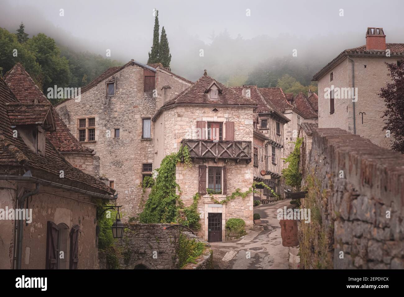 The quaint and charming French medieval hilltop village of Saint-Cirq ...