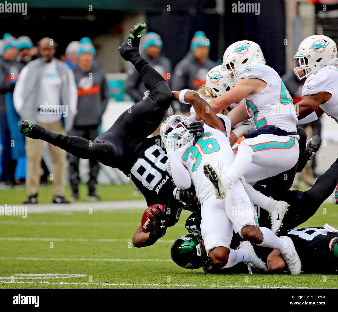 Miami Dolphins safety Adiran Colbert (36) tackles New York Jets Ty ...
