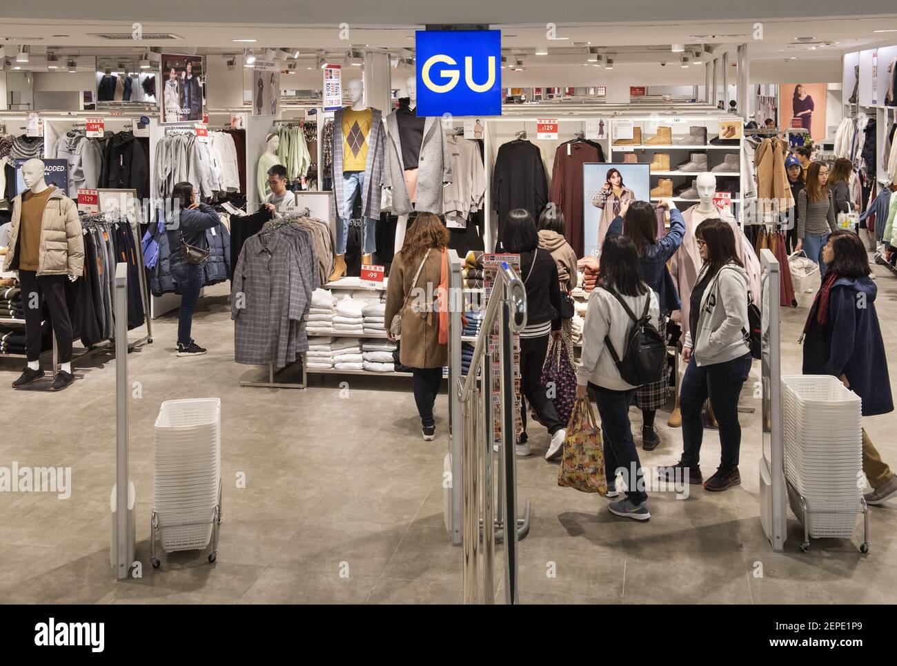 Japanese clothing brand GU store and clients seen in Hong Kong. (Photo ...