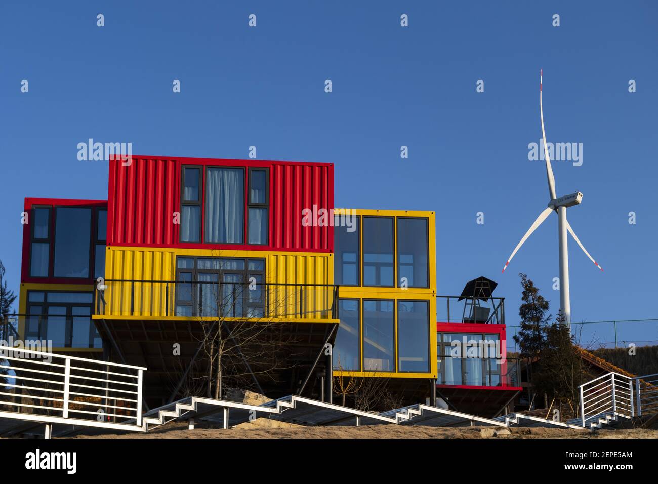 A colorful container hotel, a hotel composed of various container and ...
