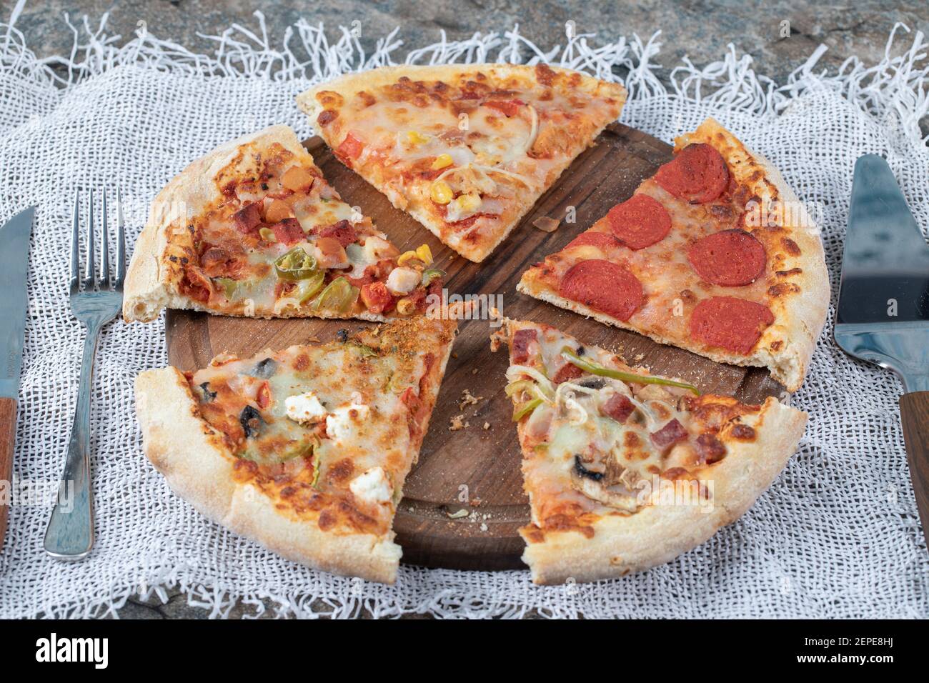 Top view of Various kind of pizza slices. Pepperoni, mozzarella and ...