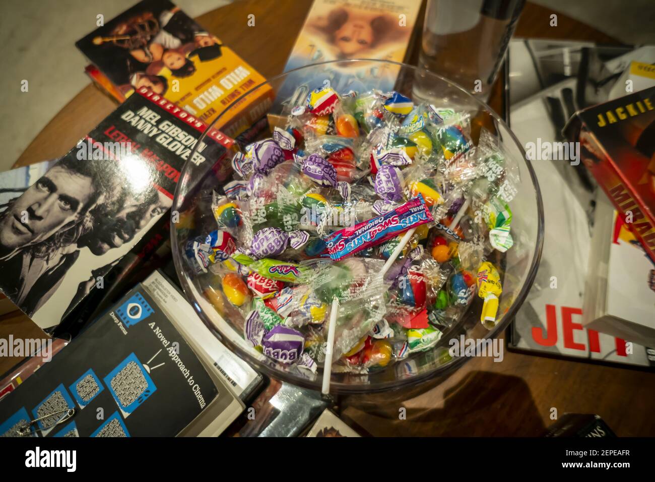 Candy bowl in a pop-up featuring merchandise with the logos of the now ...