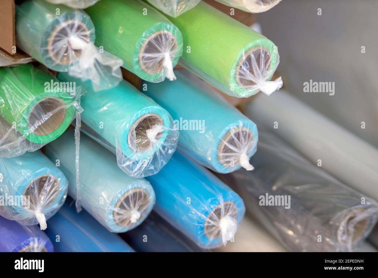 stack of colorful paper rolls for design and decoration Stock Photo - Alamy