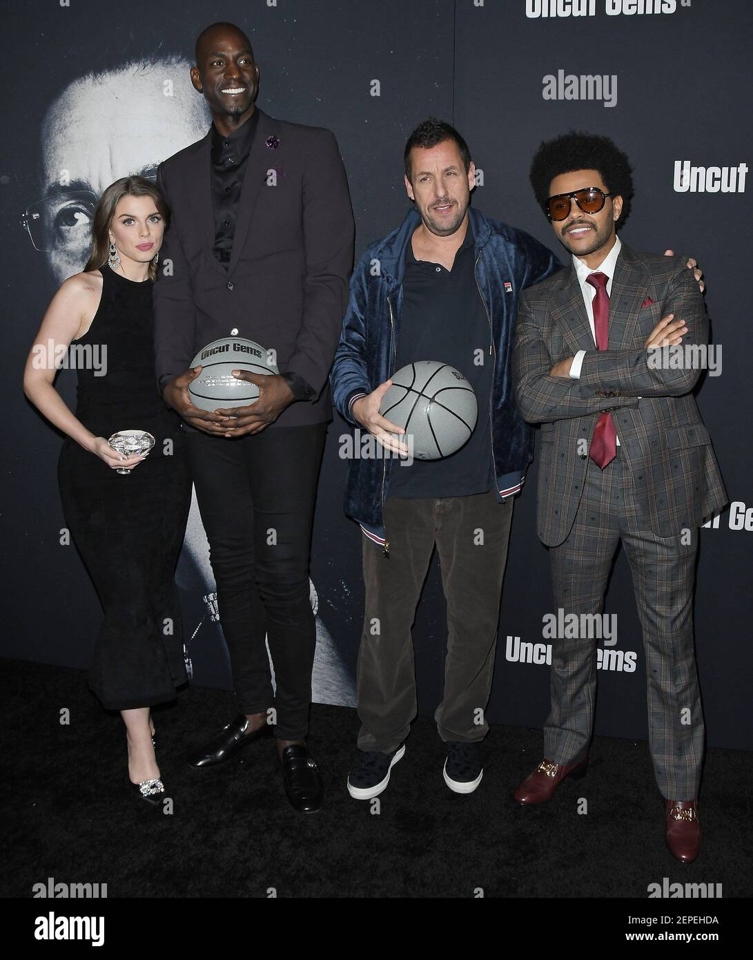 (L-R) Julia Fox, Kevin Garnett, Adam Sandler and The Weeknd at the ...