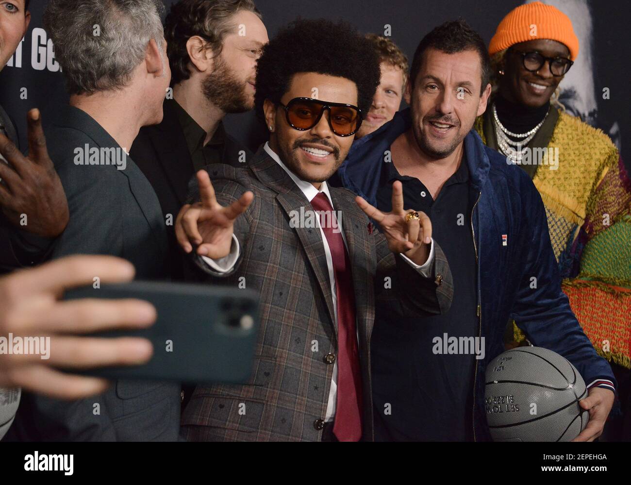 (L-R) The Weeknd and Adam Sandler at the UNCUT GEMS Los Angeles ...