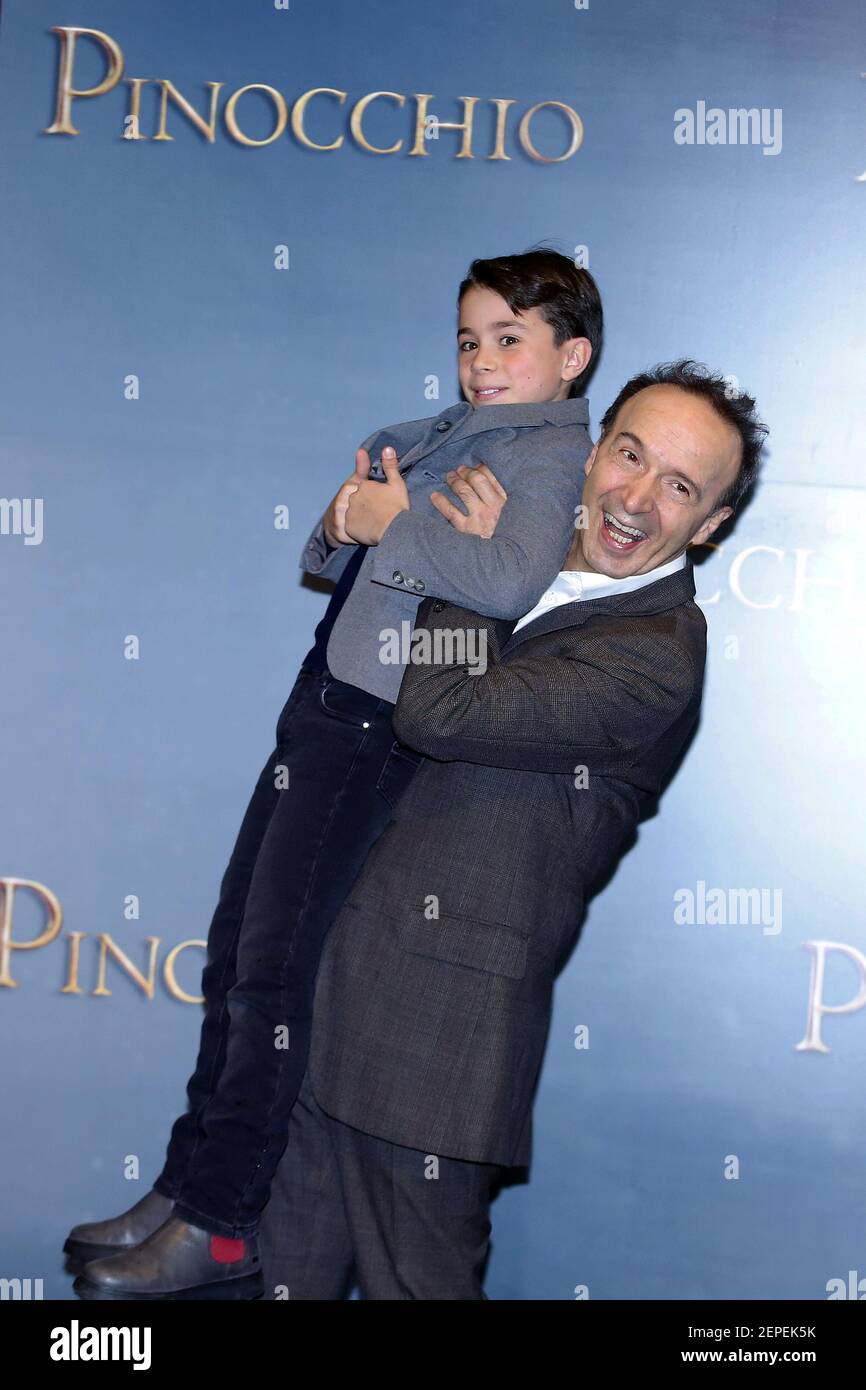 Roberto Benigni as Mister Geppetto and Federico Ielapi as Pinocchio ...