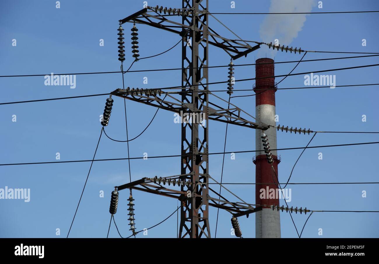 electric pylon and pipes of coal burning power station Stock Photo - Alamy