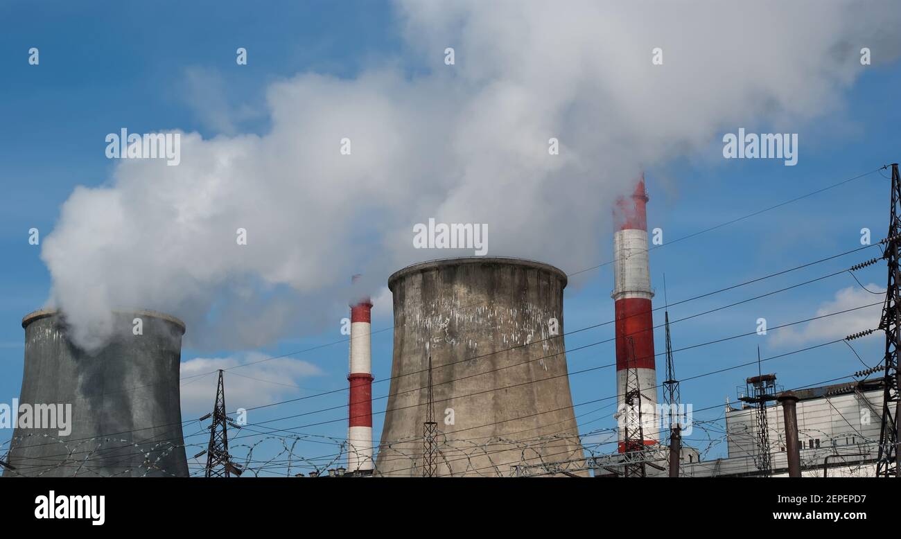 electric pylon and pipes of coal burning power station Stock Photo - Alamy