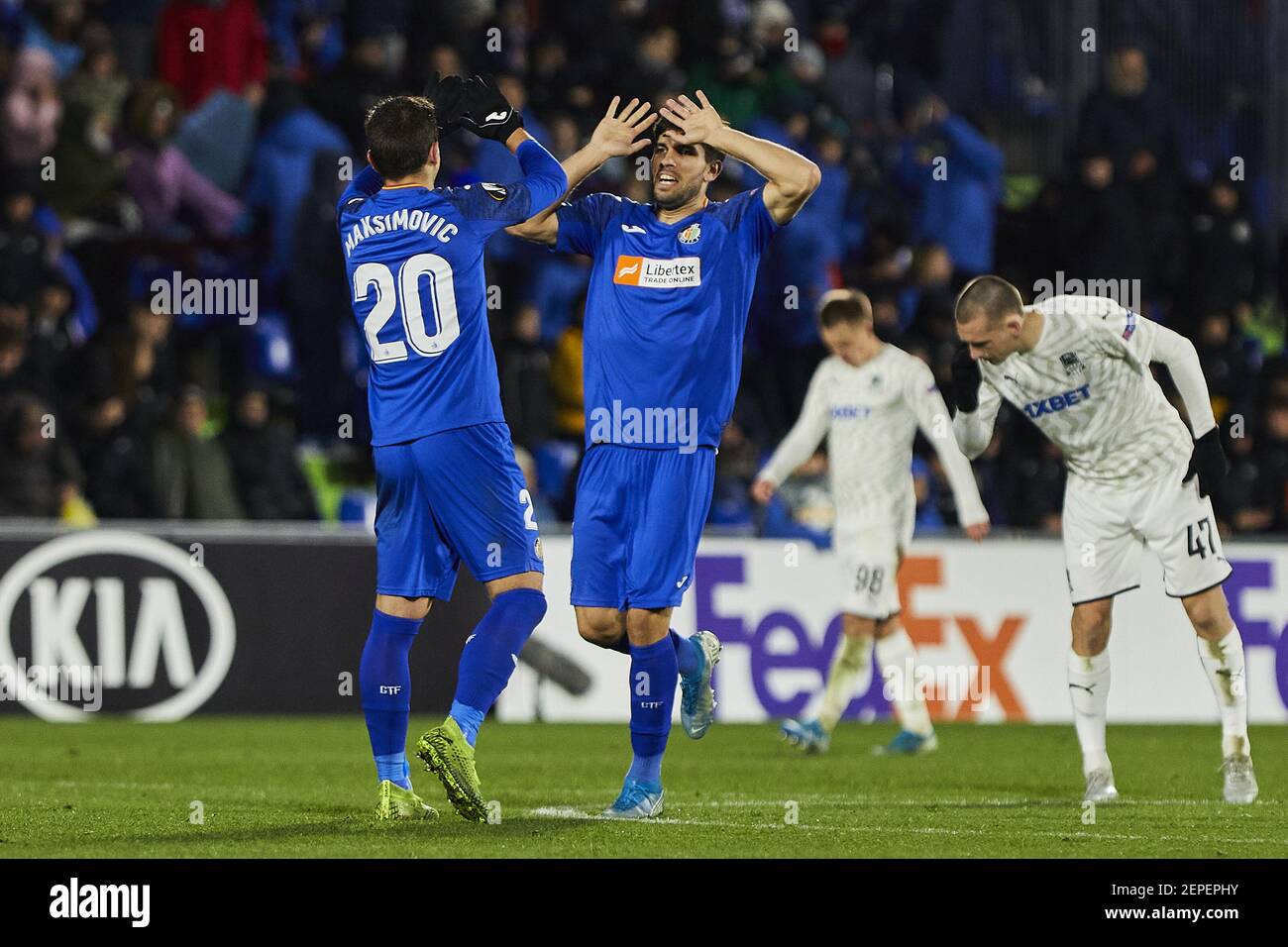 Nemanja Maksimovic (L) and Leandro Cabrera (R) of Getafe FC celebrate a goal during the UEFA ...