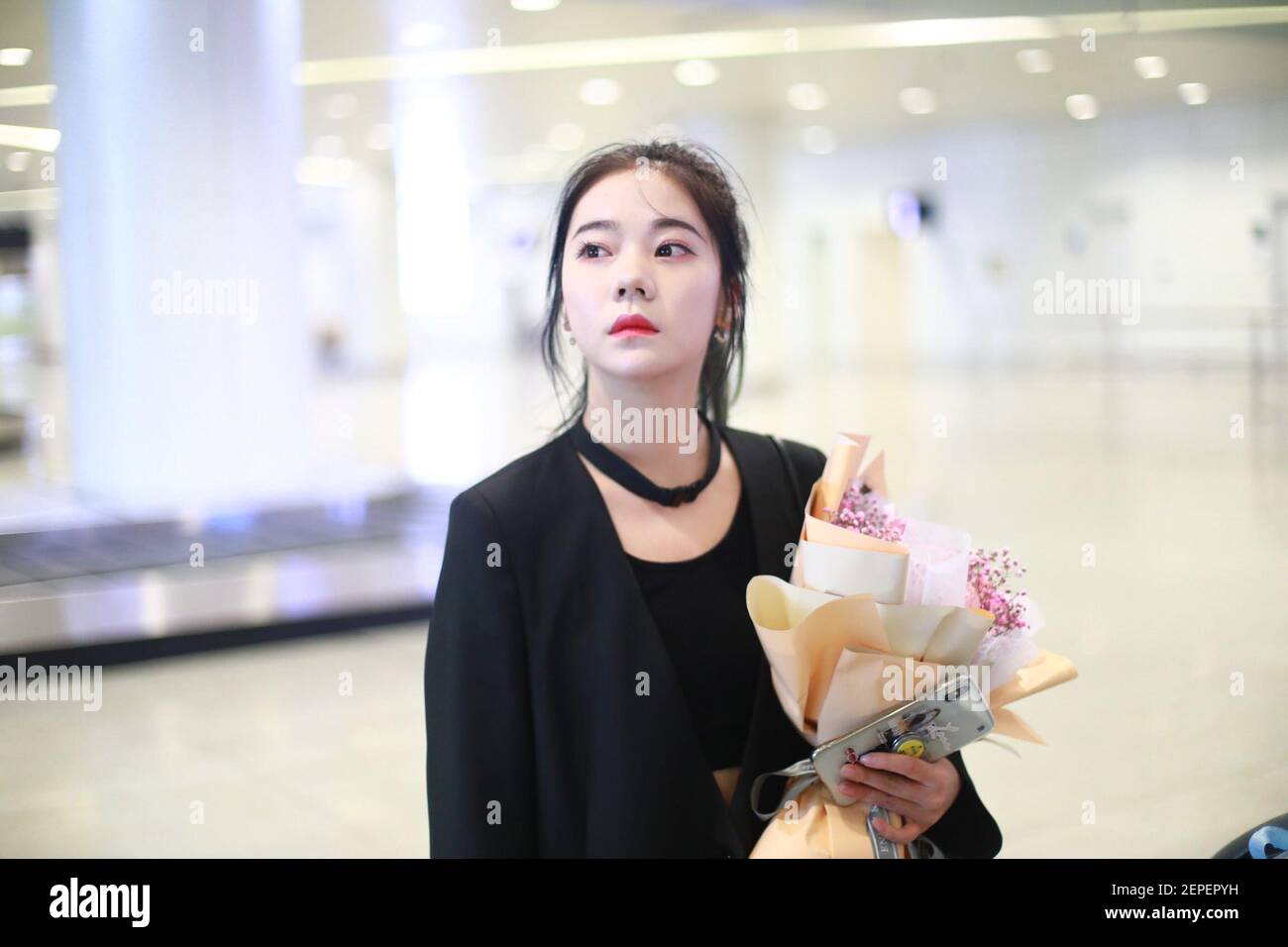 Zhang Zining of Chinese idol girl group Rocket Girls 101 arrives at ...